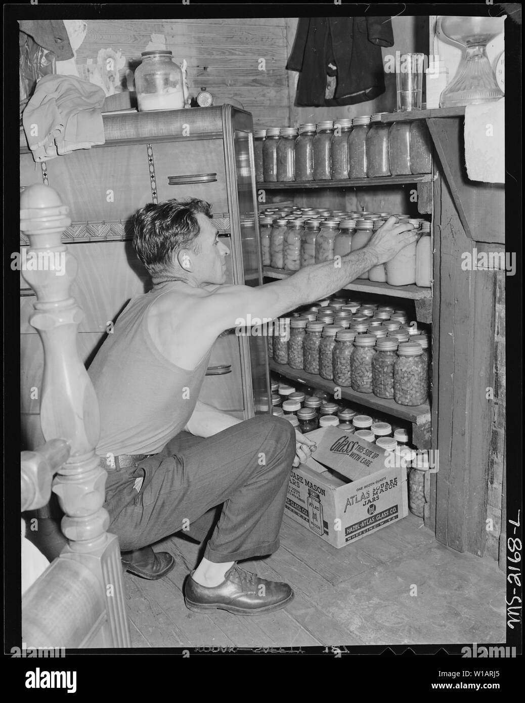 Andrew Broughton with some of the 315 quarts of fruits and vegetables ...
