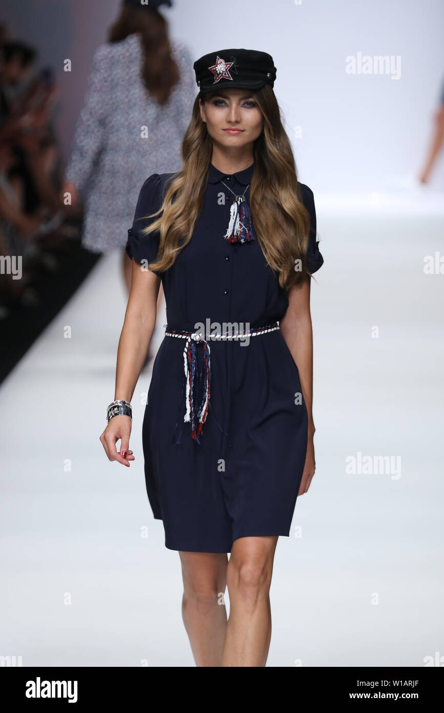 Models walk the runway at the Guido Maria Kretschmer show during the ...