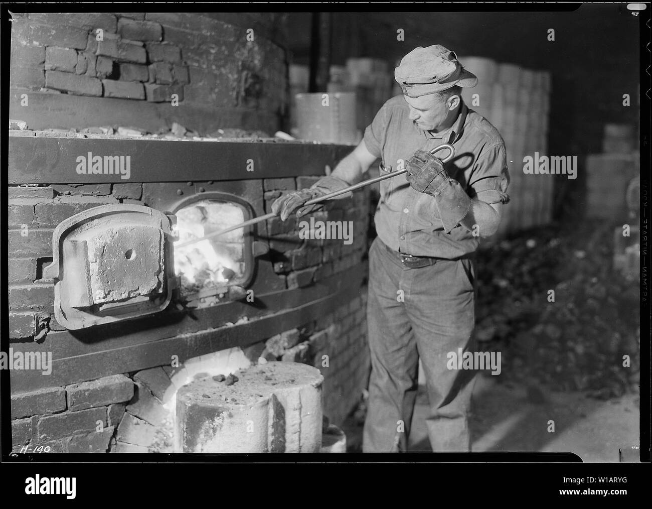 Another view of Walter Hensley, head kiln fireman at Southern Potteries ...