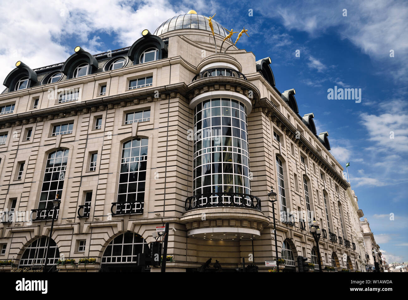 Three Golden Divers nude females on the Criterion Building with glass ...