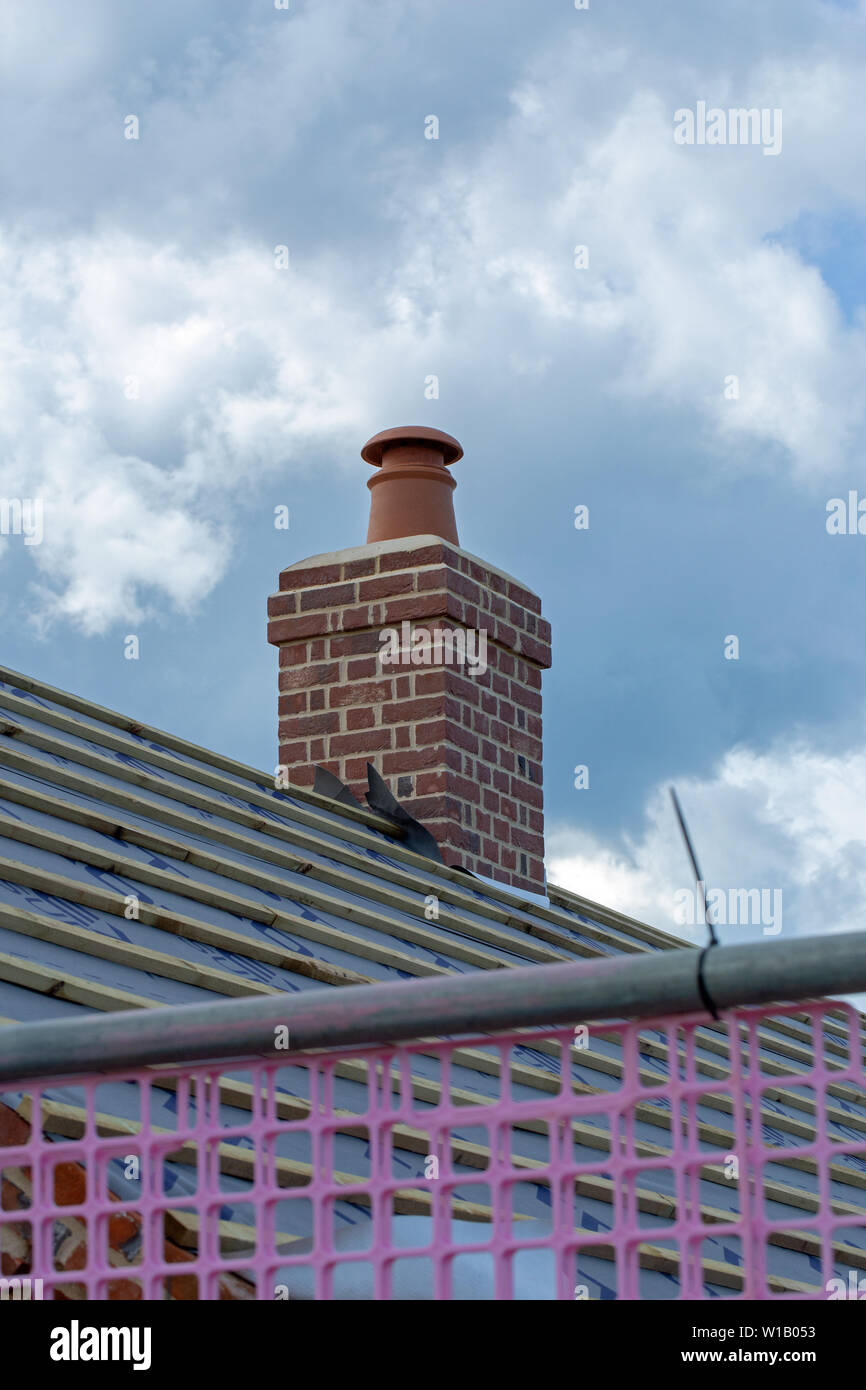 Chimney Pot, Chimney Stack above a new roof, on re-build, redundant ...
