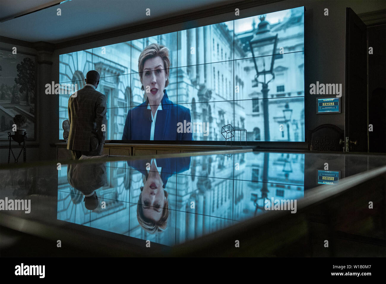 THE ROOK, (from left): Adrian Lester (back to camera), Gina McKee ...