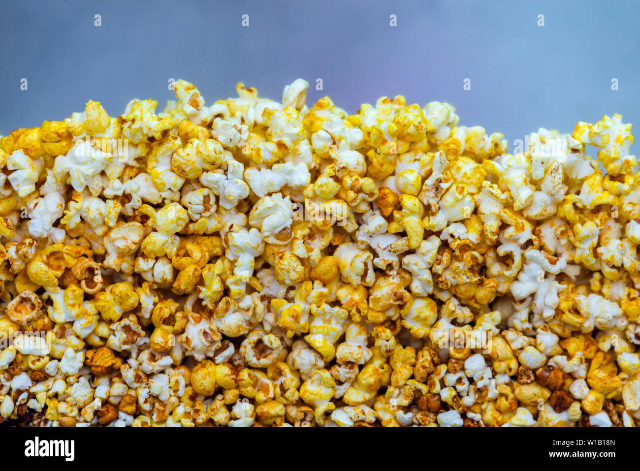 Golden caramel popcorn closeup. Background of popcorn. Snacks and food ...