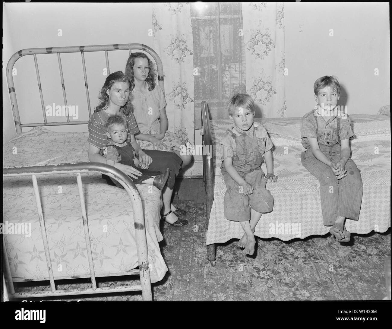 Bedroom in home of Murray Price, miner, six people sleep in these two ...