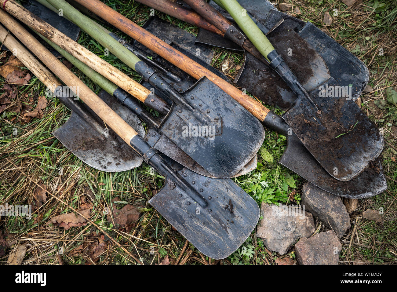 Metallic shovel with wooden handle isolated on white background, farm ...