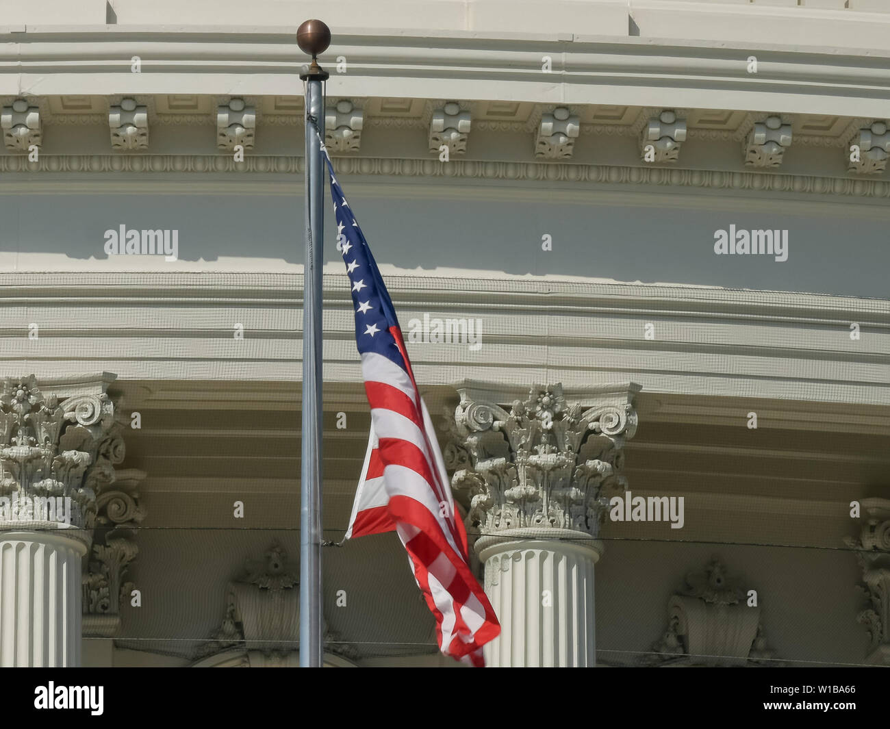 extreme close up of the flag on the us capitol building in washington ...