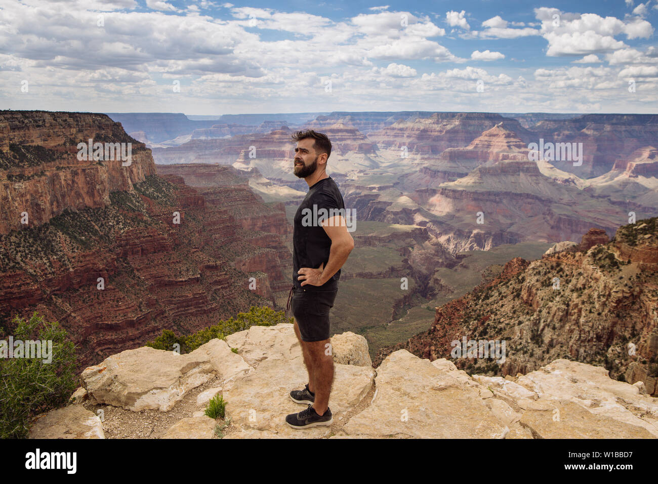 Middle aged tourist man watching the views of the South Rim, Grand ...