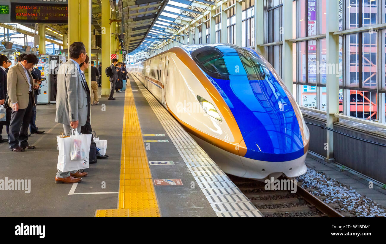 Tokyo, Japan - April 27 2018: Japanese Shinkansen high speed train at a train station Stock ...