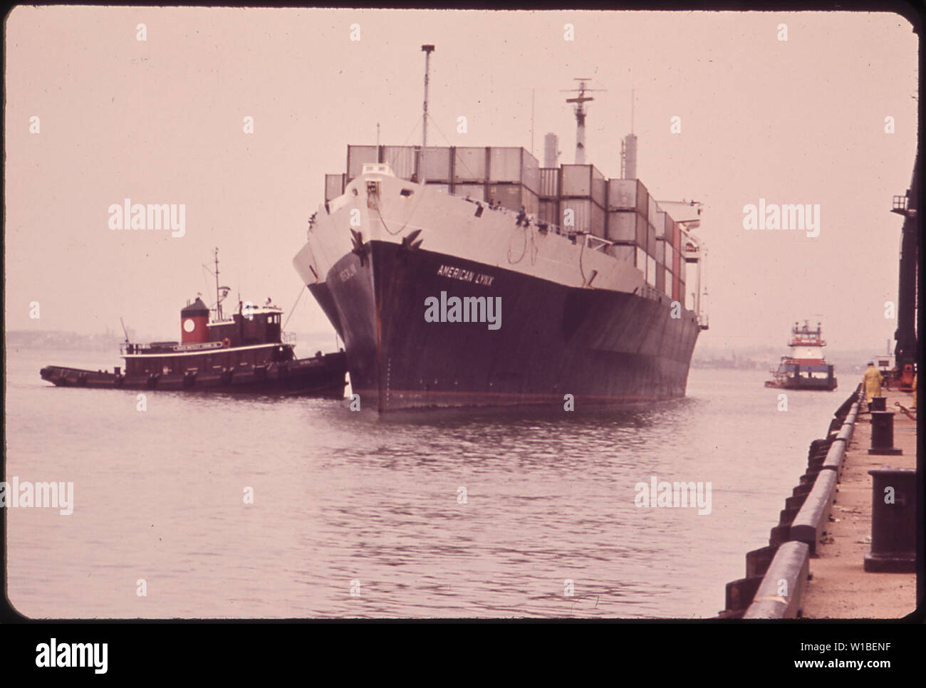CONTAINER SHIP BEING DOCKED AT DUNDALK MARINE TERMINAL, A MARYLAND PORT ...