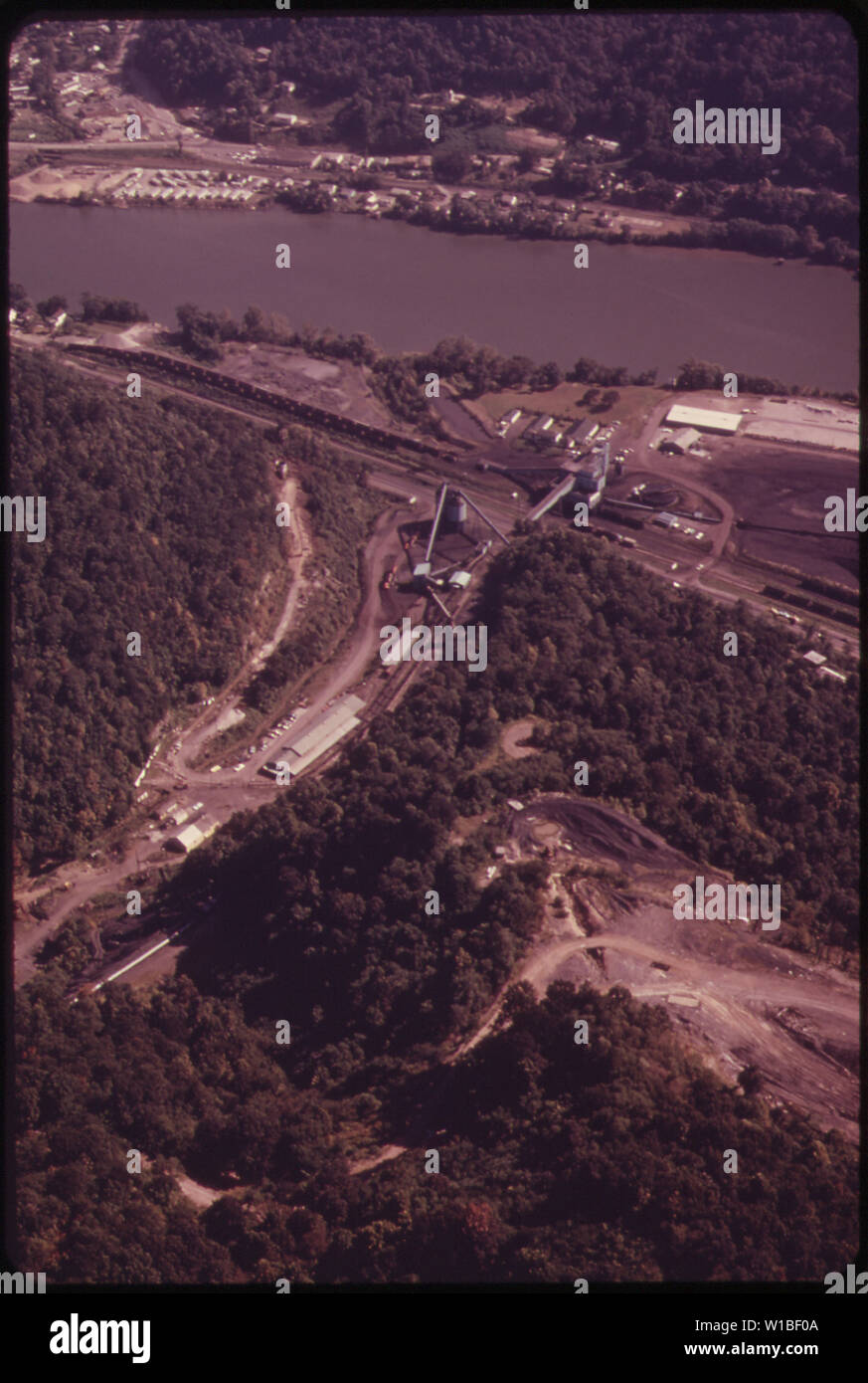 CONVEYORS TRANSPORT COAL MINED IN THE HILLS TO PLANTS ON THE RIVER FOR ...