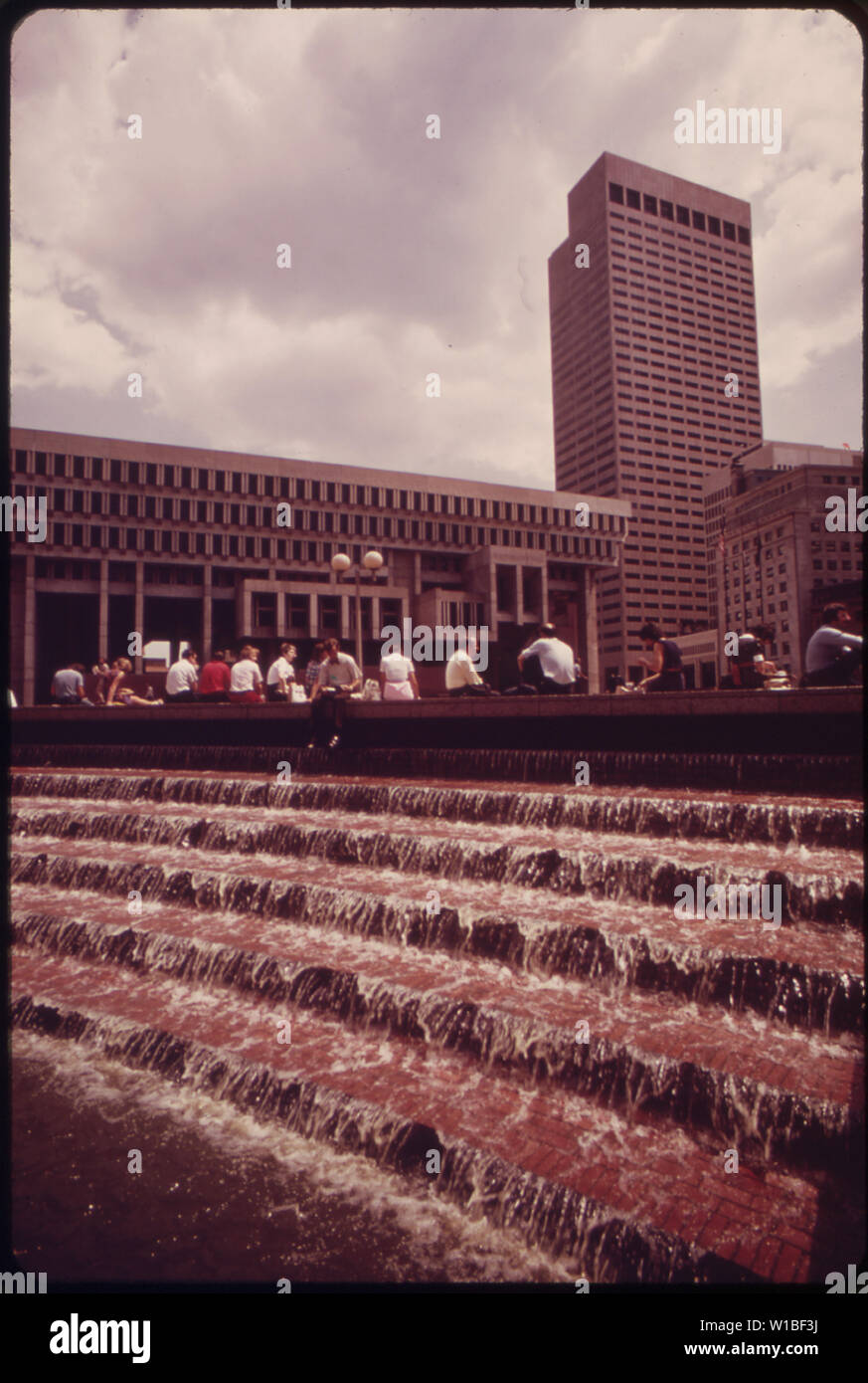 COOL WATER FALLING IN TIERS INTO BASIN AT CITY HALL PLAZA HELPS TO ...