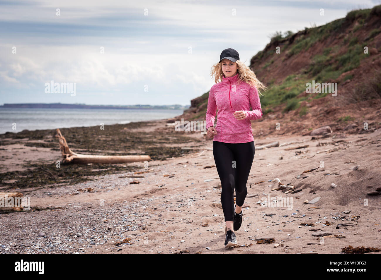 Slim blonde female hi-res stock photography and images - Alamy