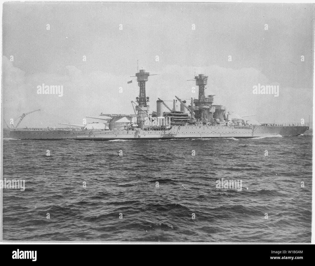 USS MARYLAND (BB-46). Aerial, starboard bow, passing under Golden Gate ...