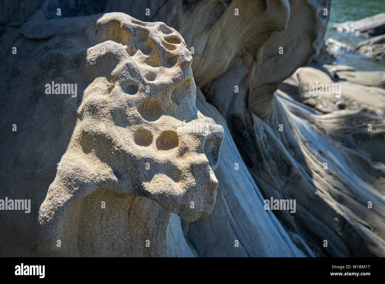 Water Worn Beach Sandstone. The water worn rocks on the shoreline of ...