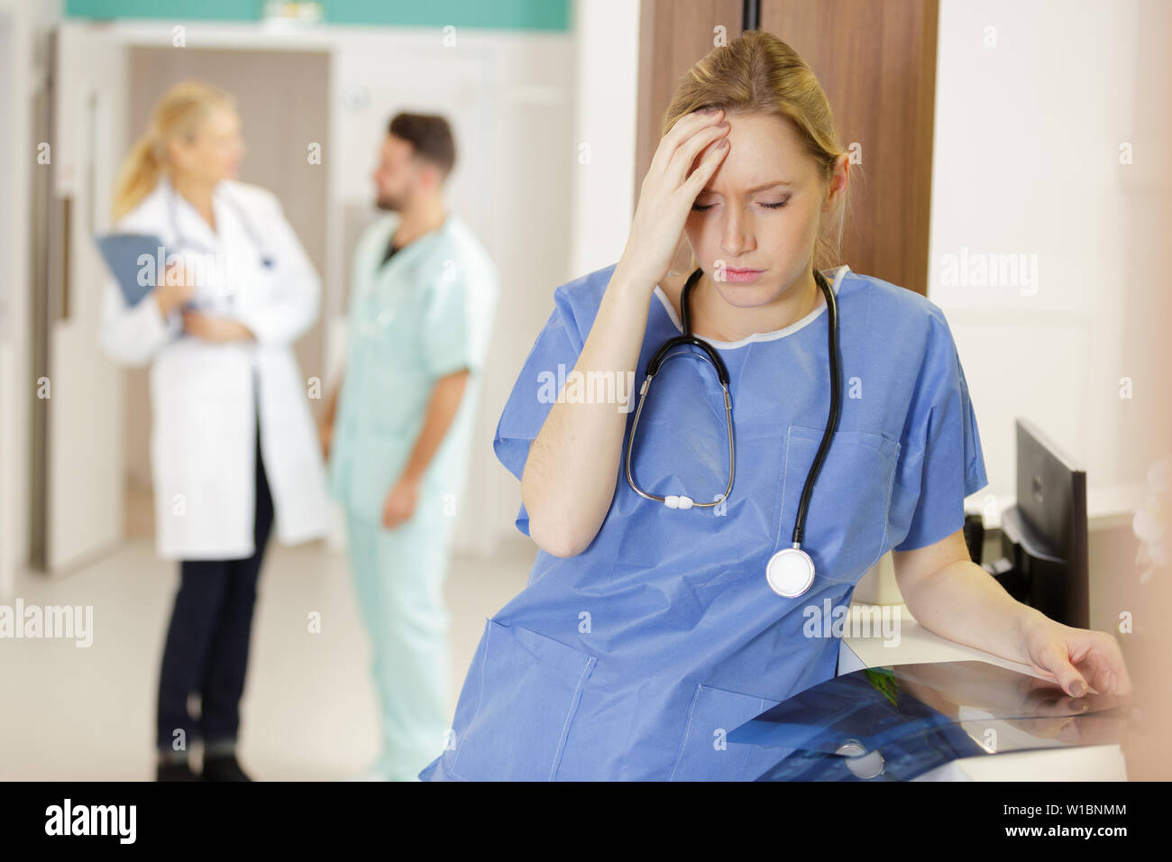 Stressed asian female doctor hi-res stock photography and images - Alamy