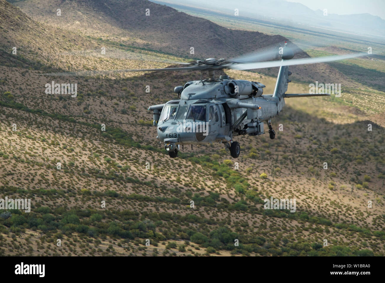 An MH-60S Seahawk Helicopter assigned to Sea Combat Squadron SIX (HSC-6 ...