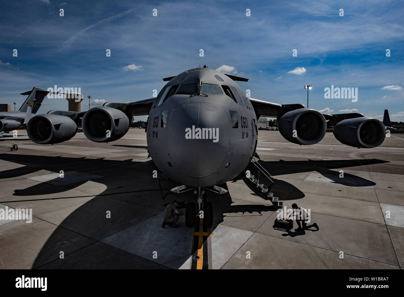 Members of the 911th Aircraft Maintenance Squadron perform routine ...