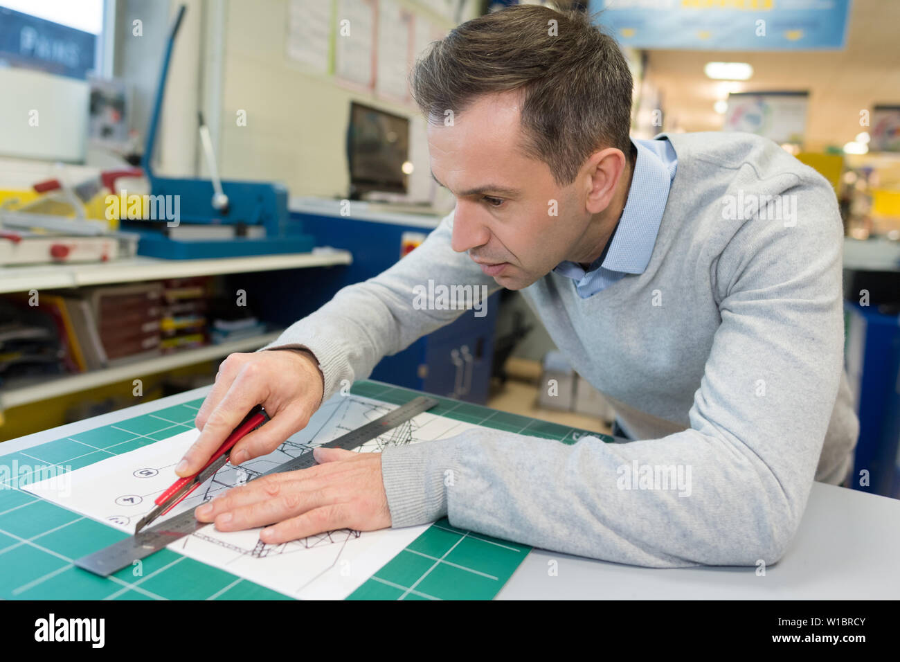 Pattern cutter fashion hi-res stock photography and images - Alamy