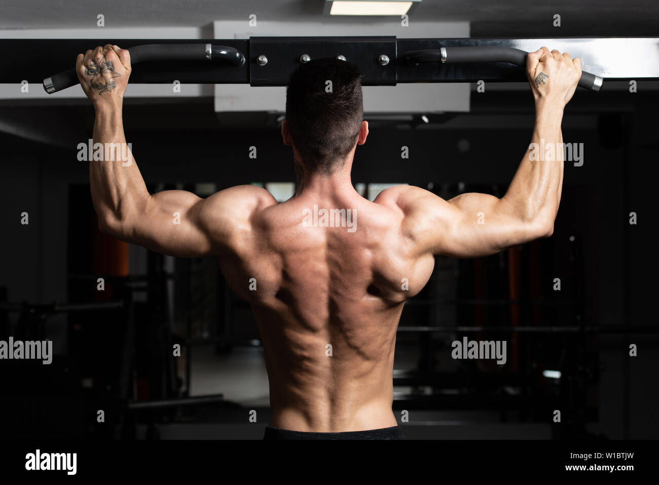 Bodybuilder Doing Pull Ups Best Back Exercises Stock Photo - Alamy