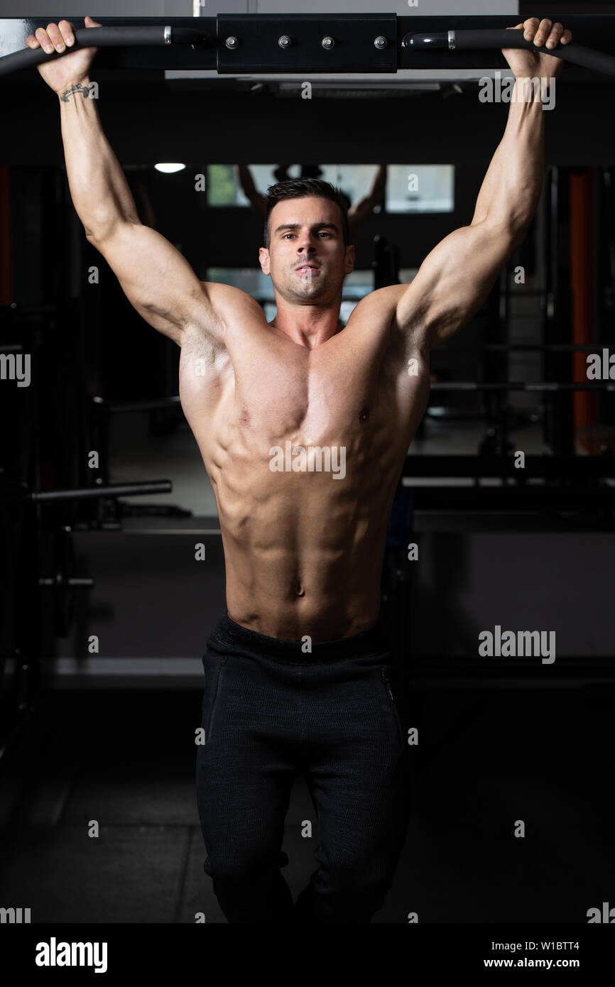 Bodybuilder Doing Pull Ups Best Back Exercises Stock Photo - Alamy
