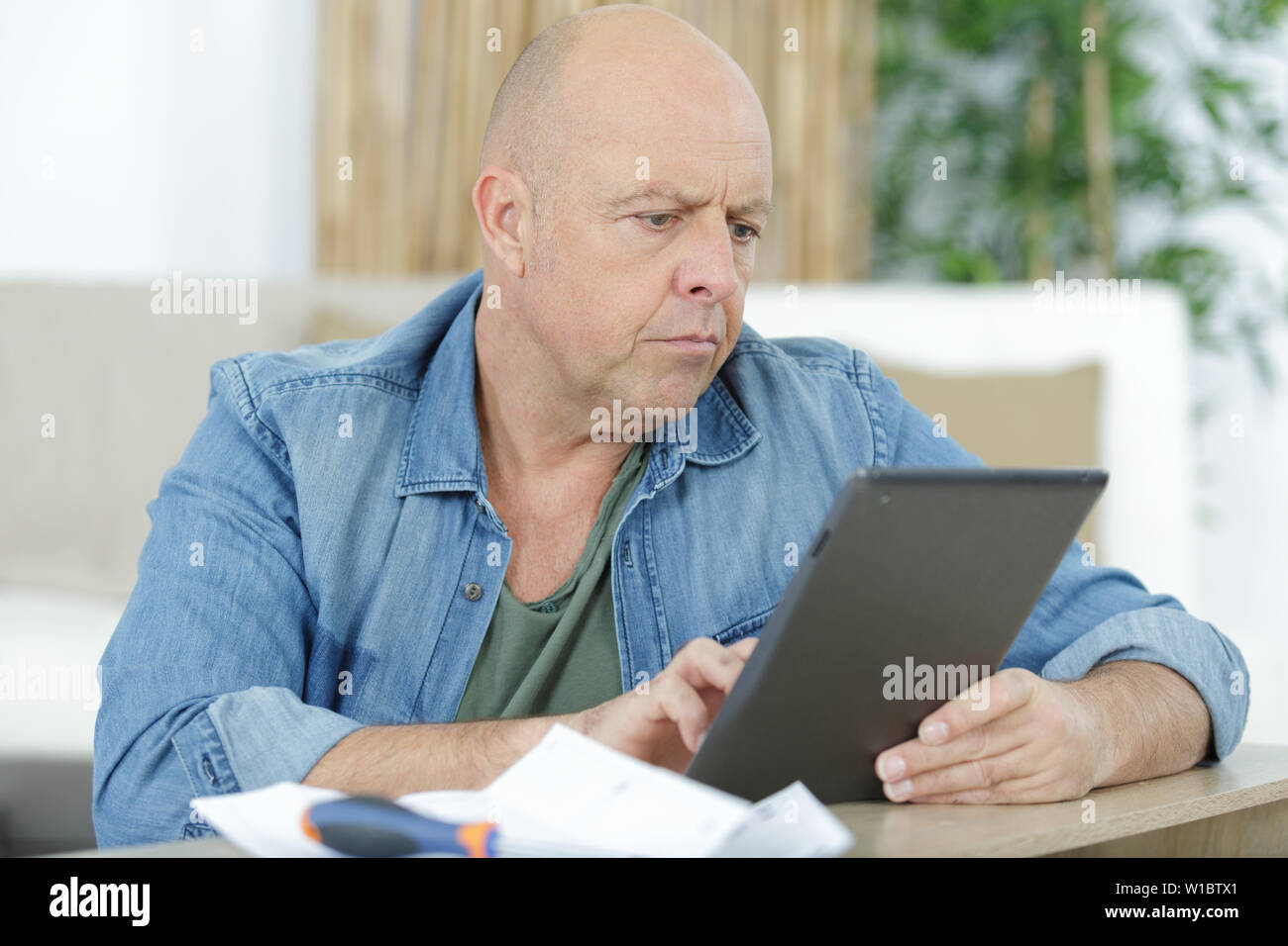Person reading the computer manual hi-res stock photography and images ...