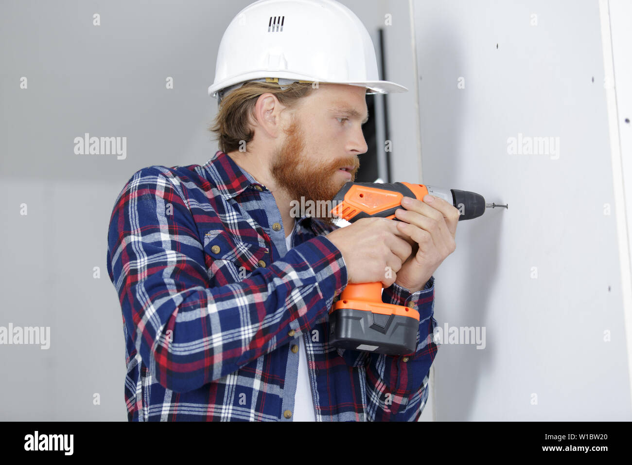 Construction worker bore wall hi-res stock photography and images - Alamy