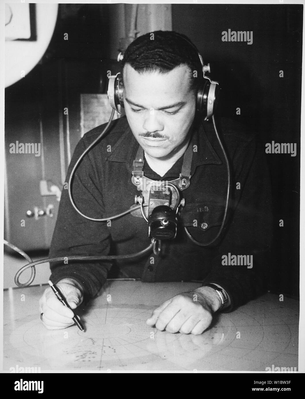 Coast Guardsman Joseph K. Noel, Radioman third class, is pictured on ...