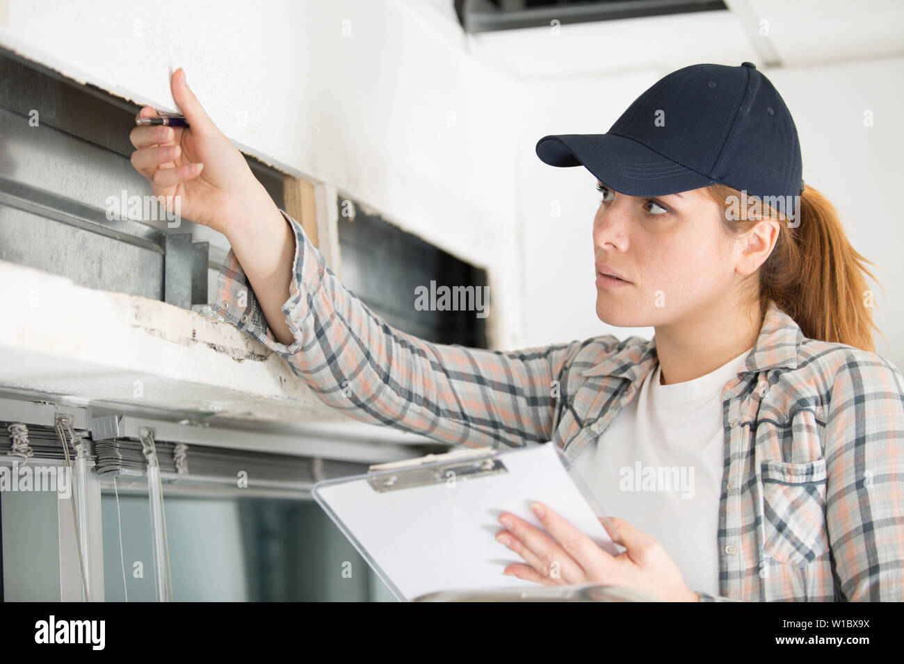 Person fitting window hi-res stock photography and images - Alamy