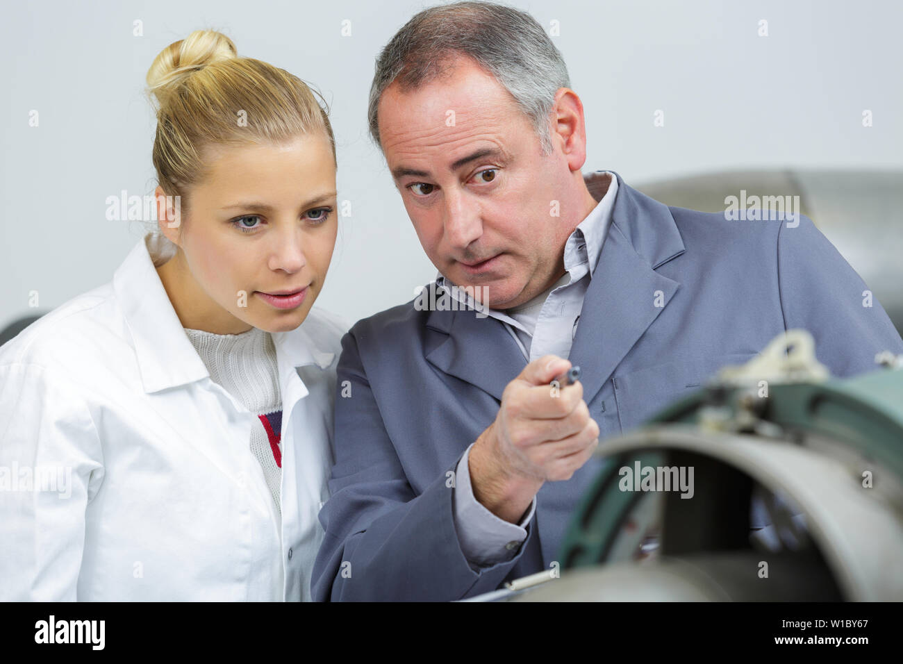Instructing coworkers hi-res stock photography and images - Alamy