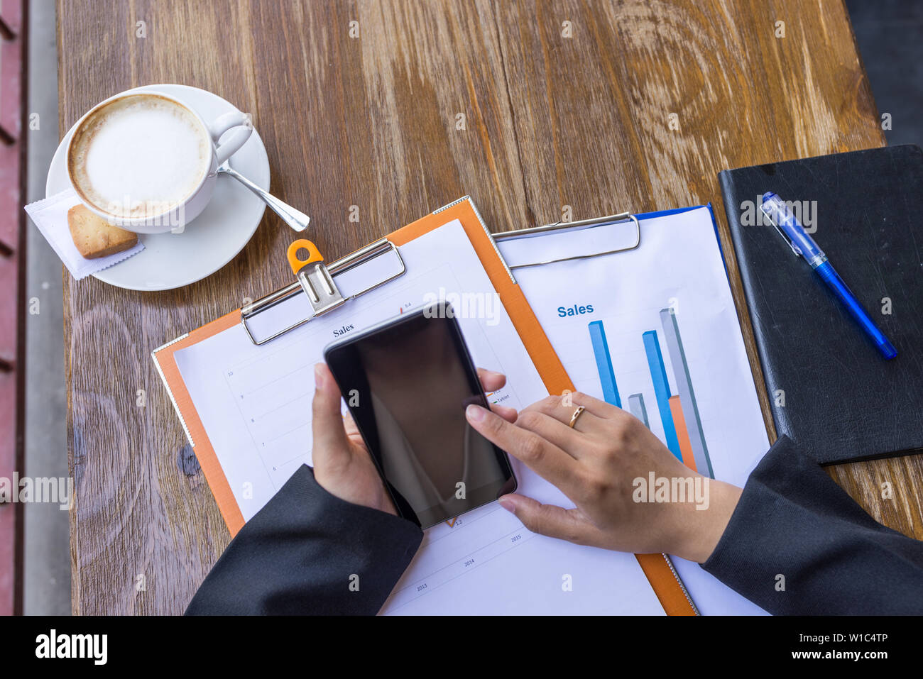 Tapping cellphone hi-res stock photography and images - Alamy