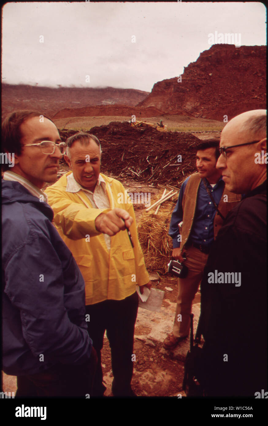 DR. GEORGE RICE (IN YELLOW JACKET) WAS EPA'S ON-SCENE COORDINATOR FOR ...