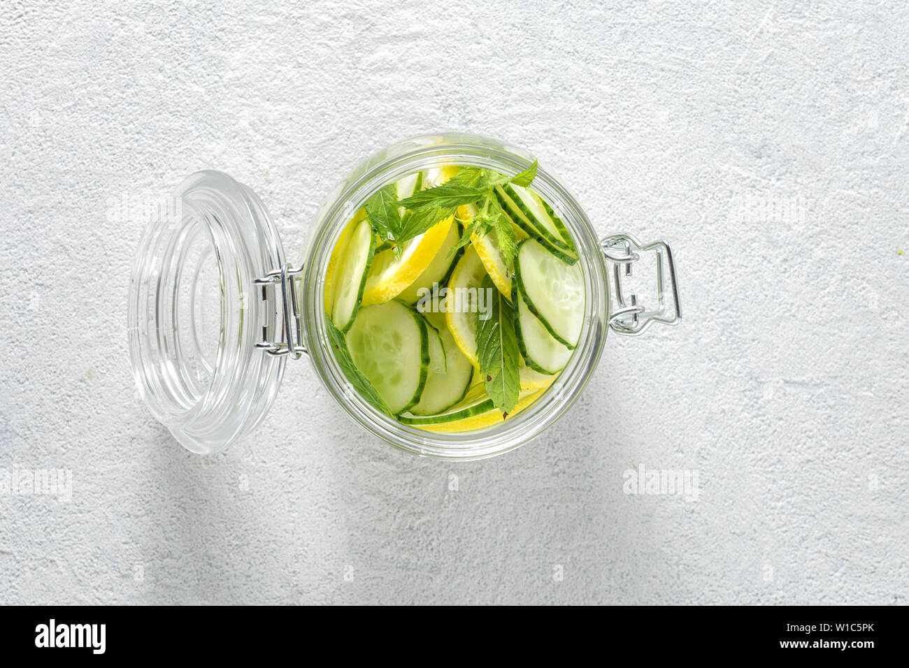 Detox drink cucumber water in the glass top view. Diet concept Stock ...