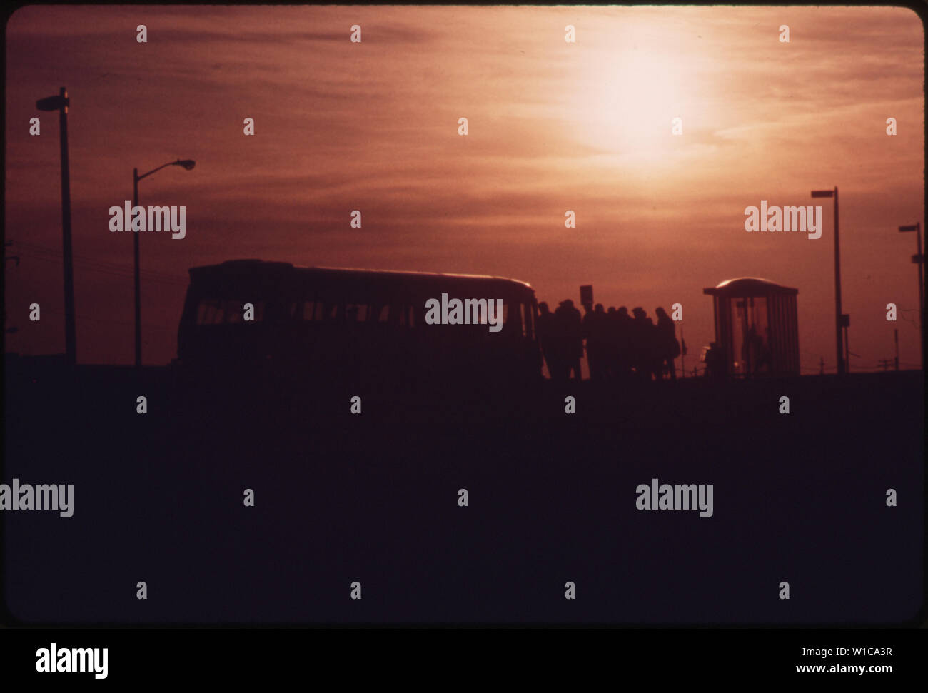 EARLY MORNING COMMUTERS AT METRO PARK AND RIDE BUS STATION Stock Photo ...