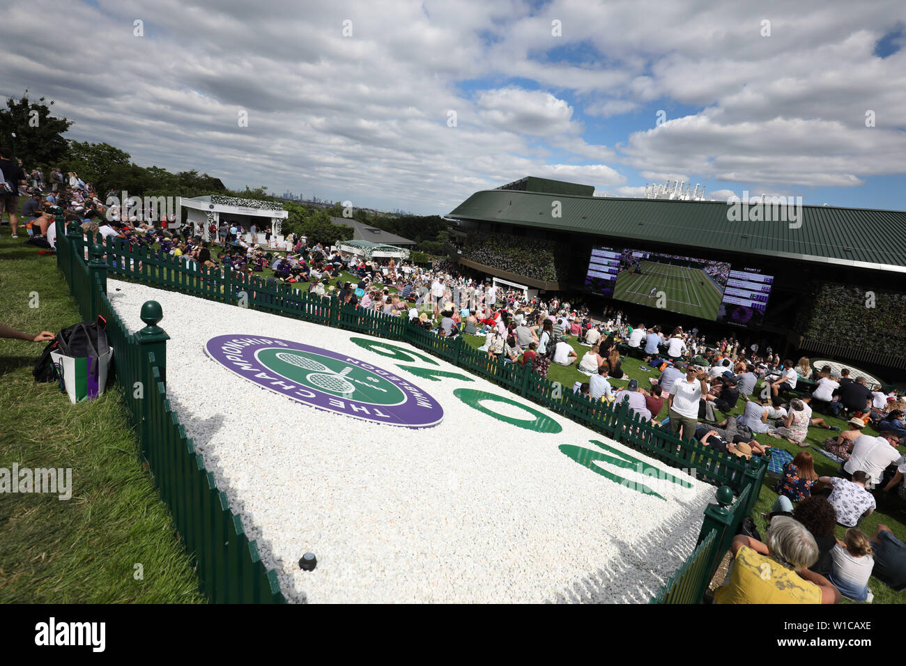 Wimbledon, London, UK. 1st July 2019. t's a beautiful day as the sun ...