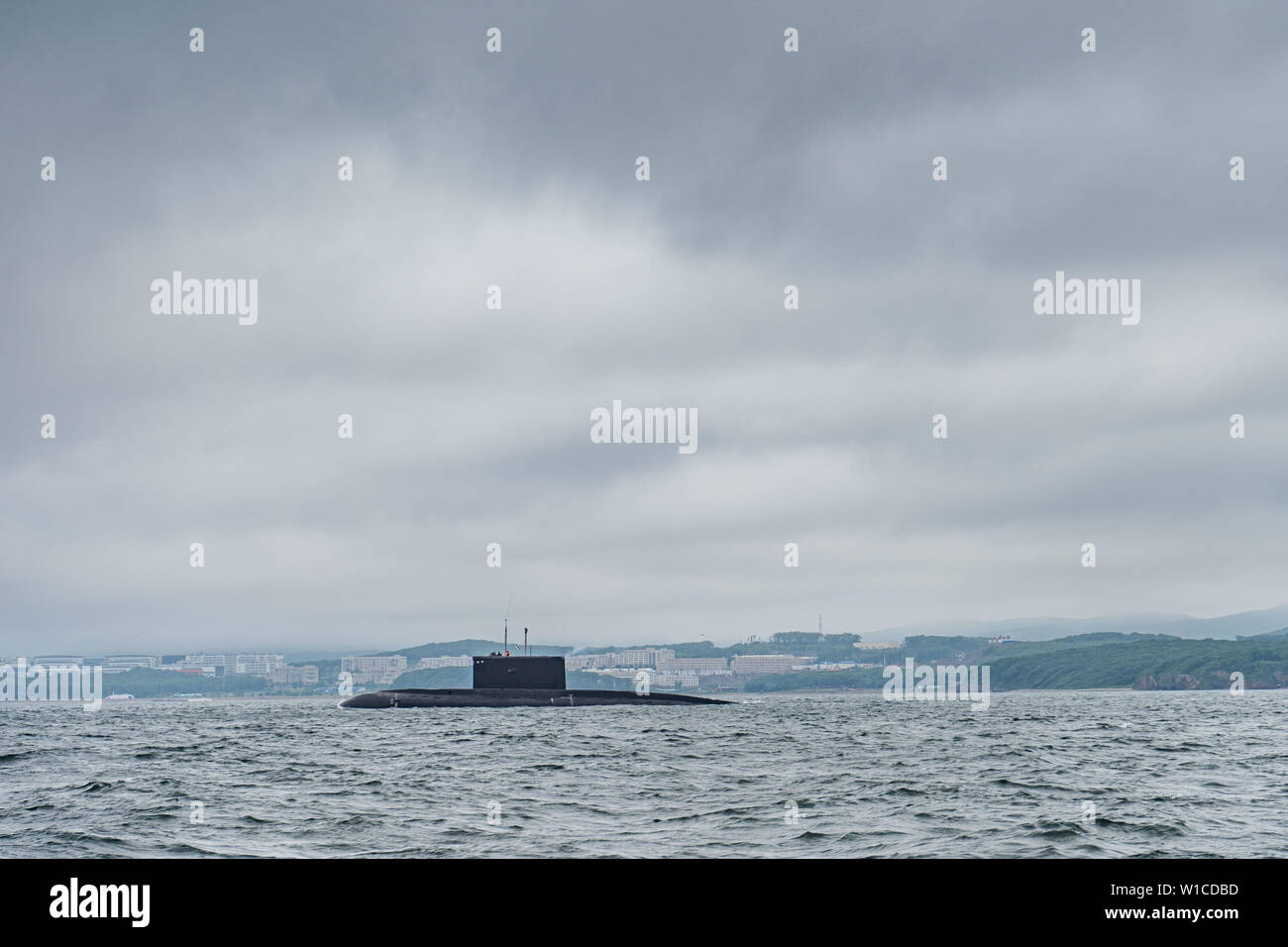 A line of modern russian military submarine cruisers in the row ...