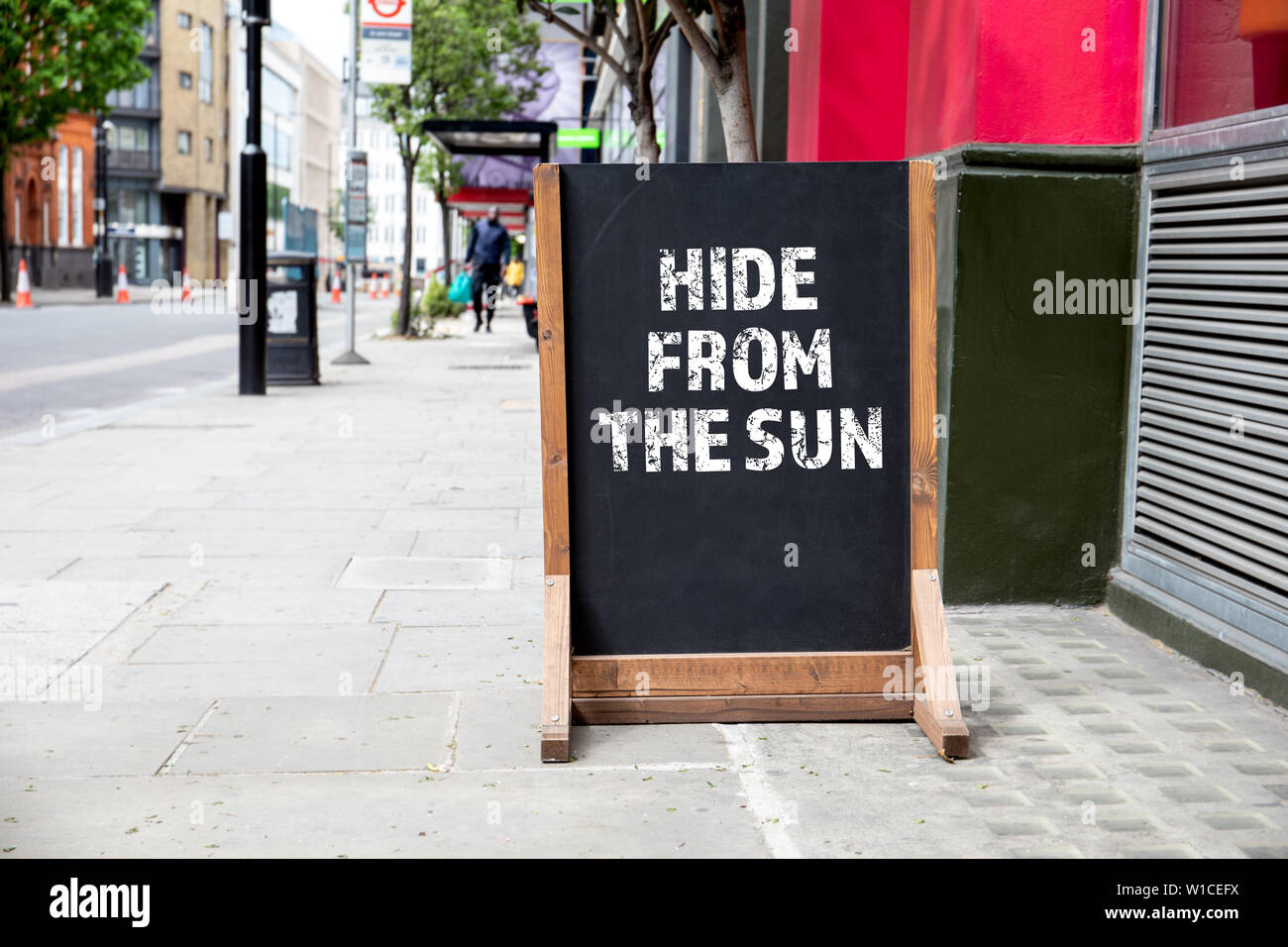 Hide from the sun Stock Photo - Alamy