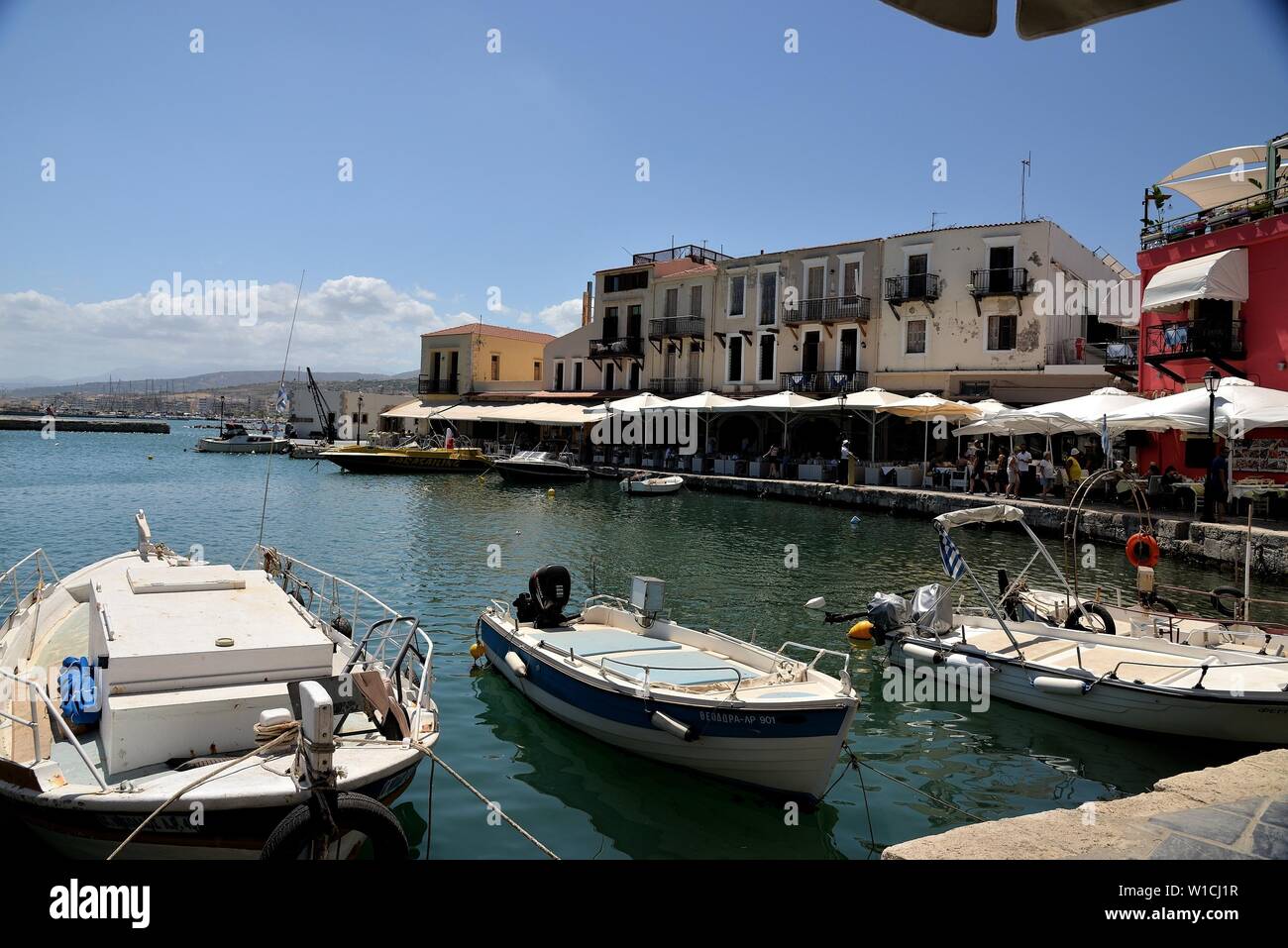 Venetian harbour restaurants rethymnon hi-res stock photography and ...