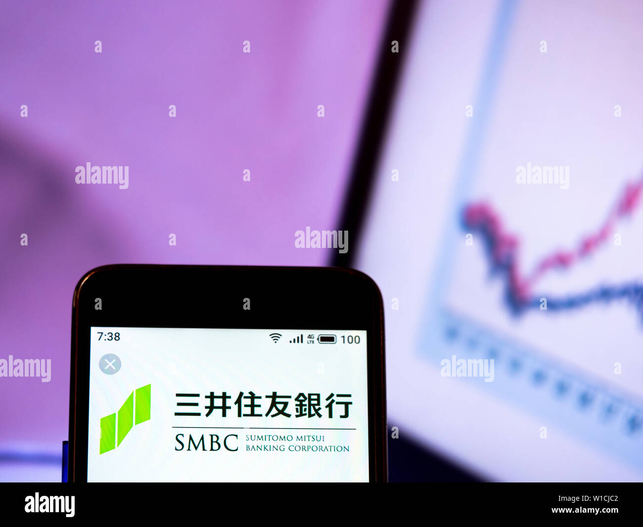 In this photo illustration the Sumitomo Mitsui Financial Group logo is ...