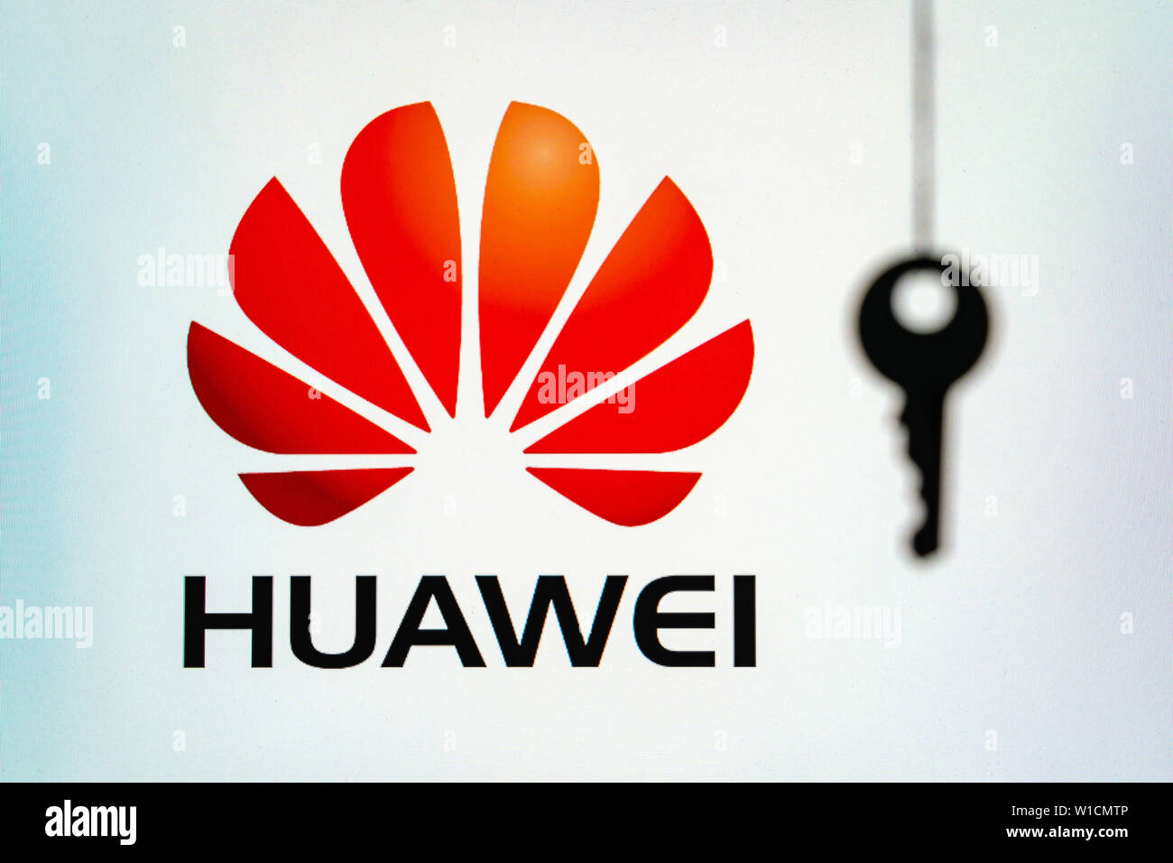 Huawei logo in background with silhouette of a unlock padlock and a key ...