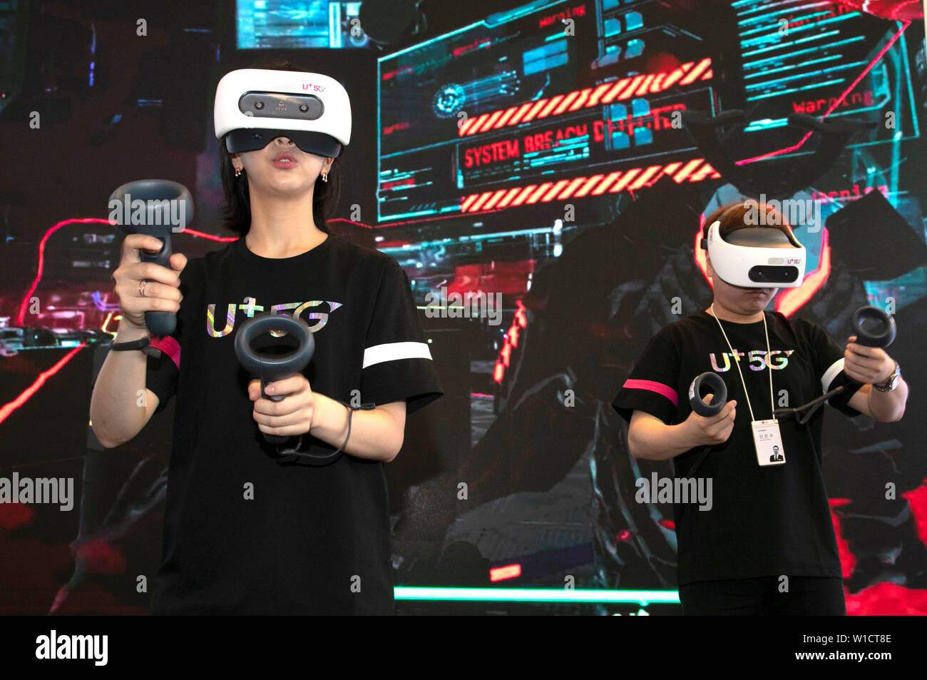 02nd July, 2019. World's first 5G-based cloud VR game Employees of ...