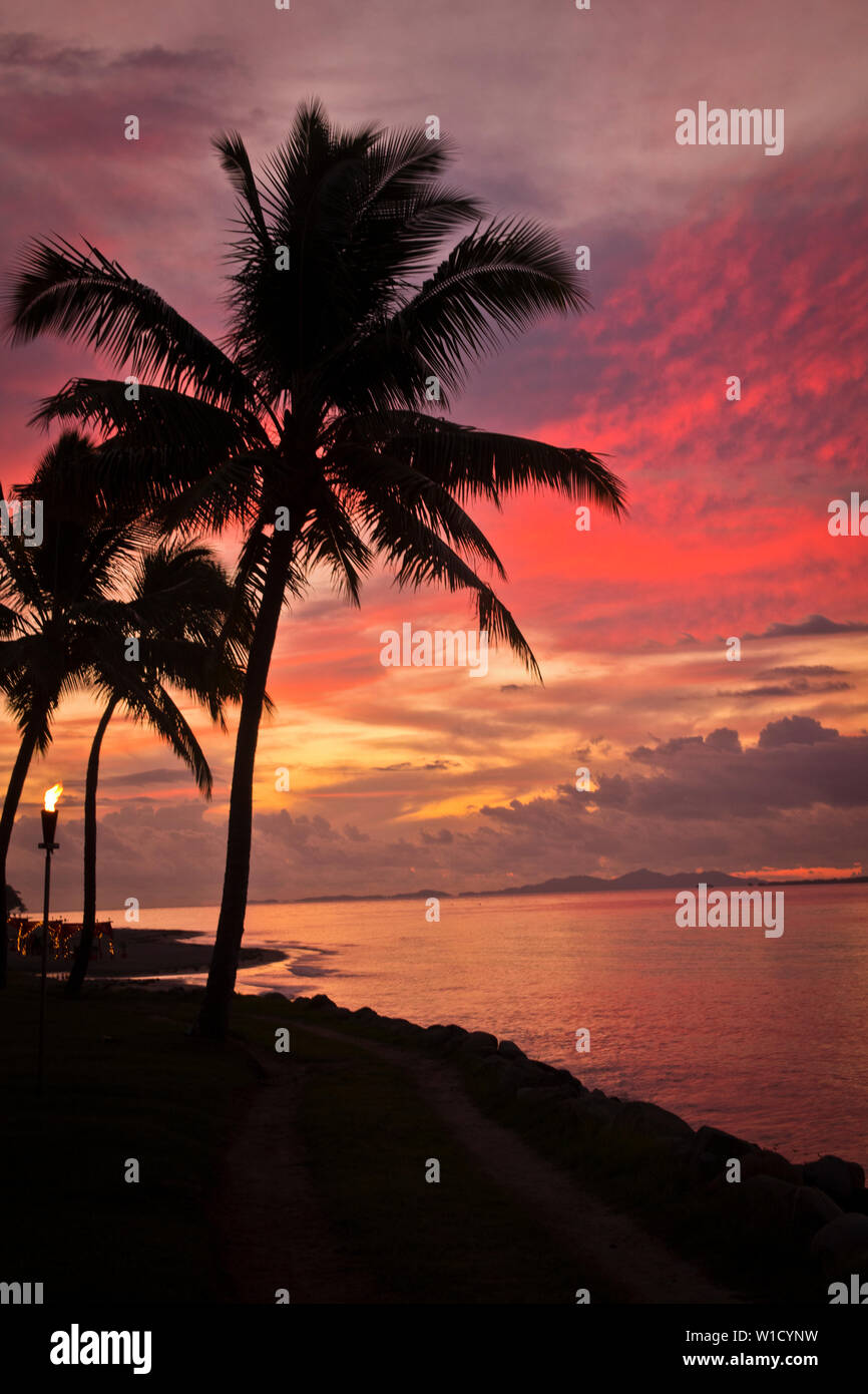 Fiji Sunset over the ocean Stock Photo - Alamy