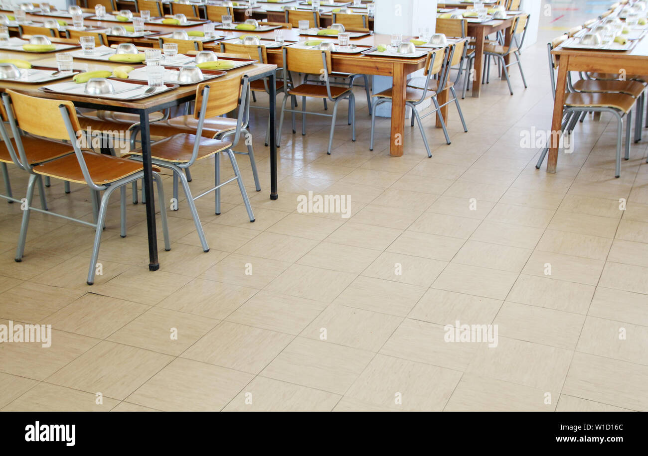 Interior view of an empty school canteen with tables and chairs Stock ...