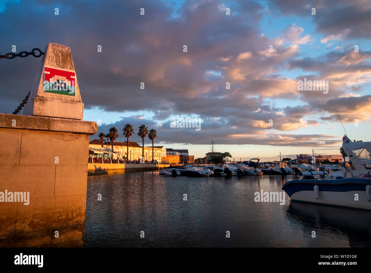 View of the beautiful marina of Faro city at sunset Stock Photo - Alamy