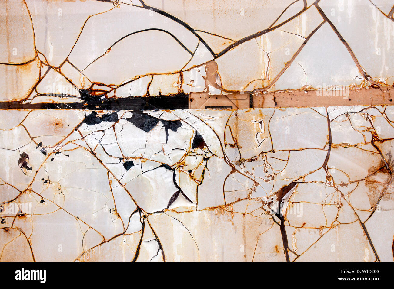 dirty plastic texture with wrinkles, cracks and sunburnt glued to glass ...