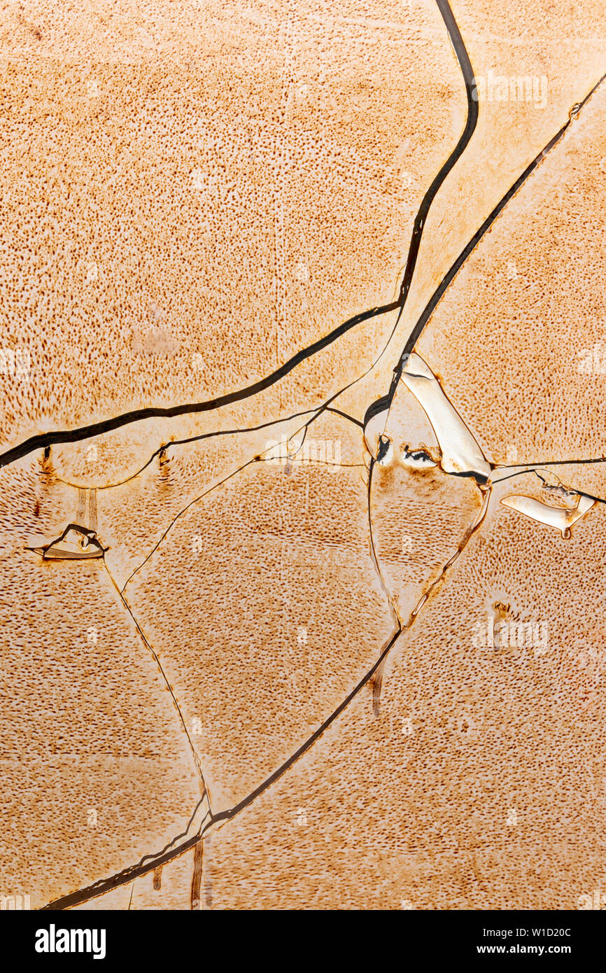 dirty plastic texture with wrinkles, cracks and sunburnt glued to glass ...