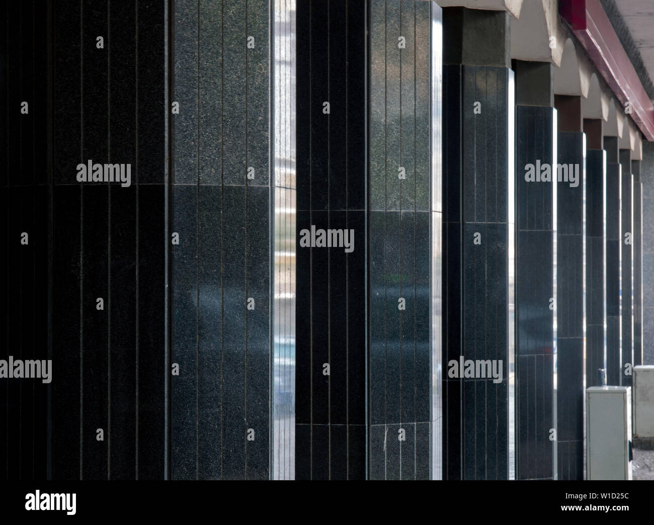 Close up view of modern pillars of office building Stock Photo - Alamy