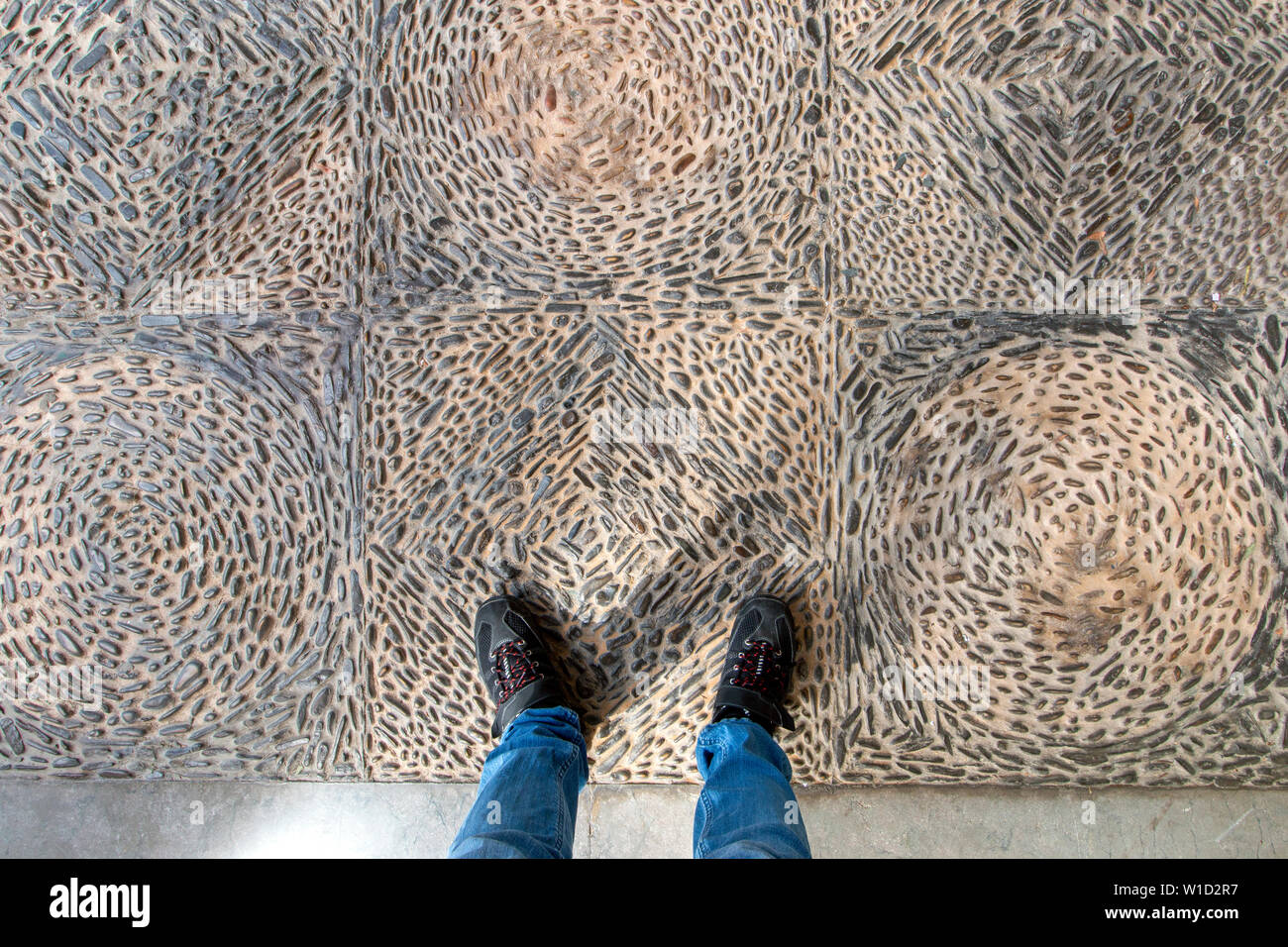 Close up view of pebblestone ground texture Stock Photo - Alamy