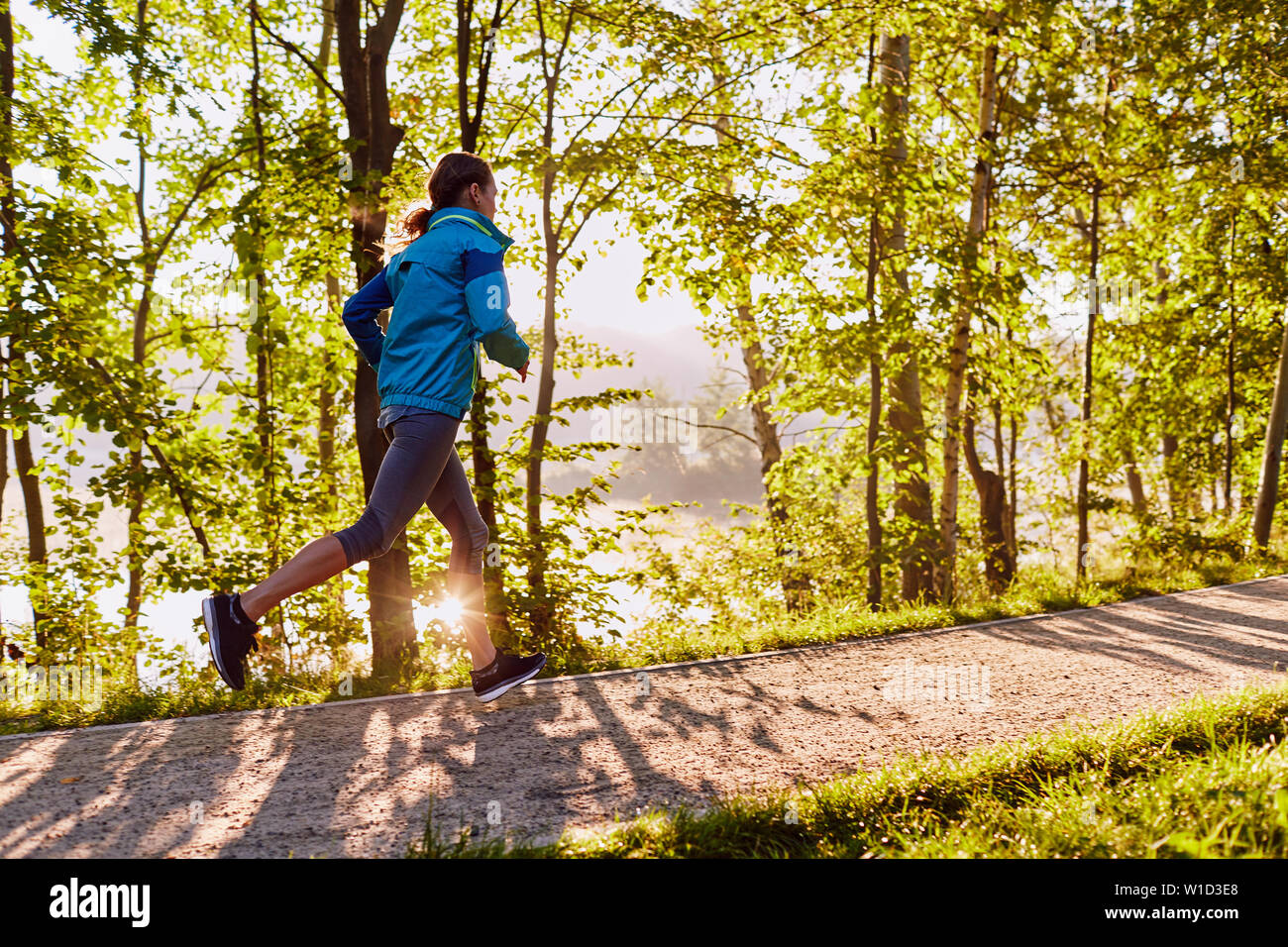 One woman running summer exercise hi-res stock photography and images ...
