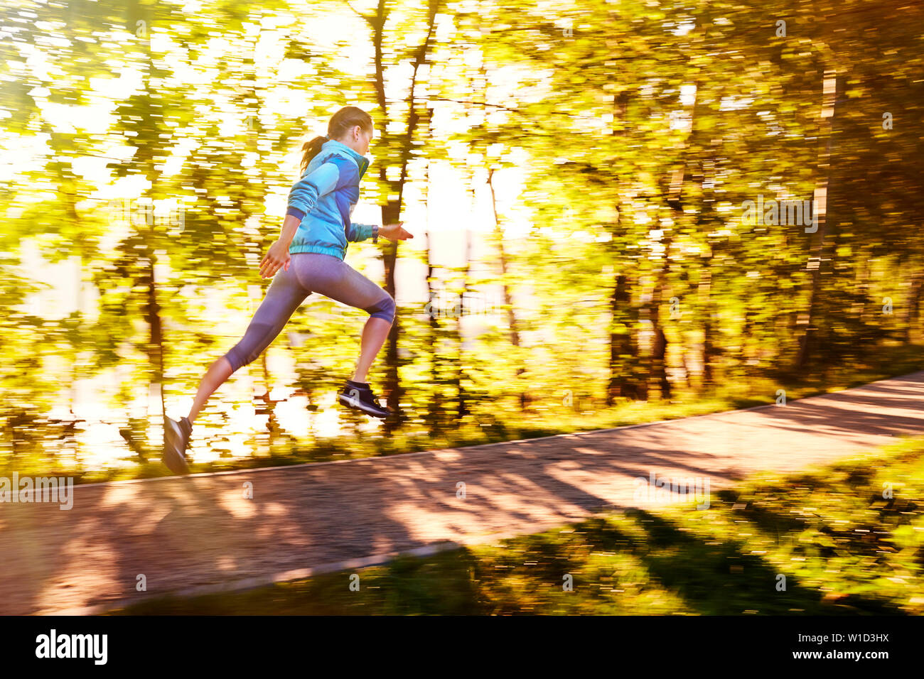Woman blur running hi-res stock photography and images - Alamy