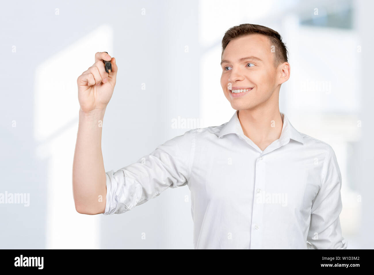 Handsome man making drawing hi-res stock photography and images - Alamy